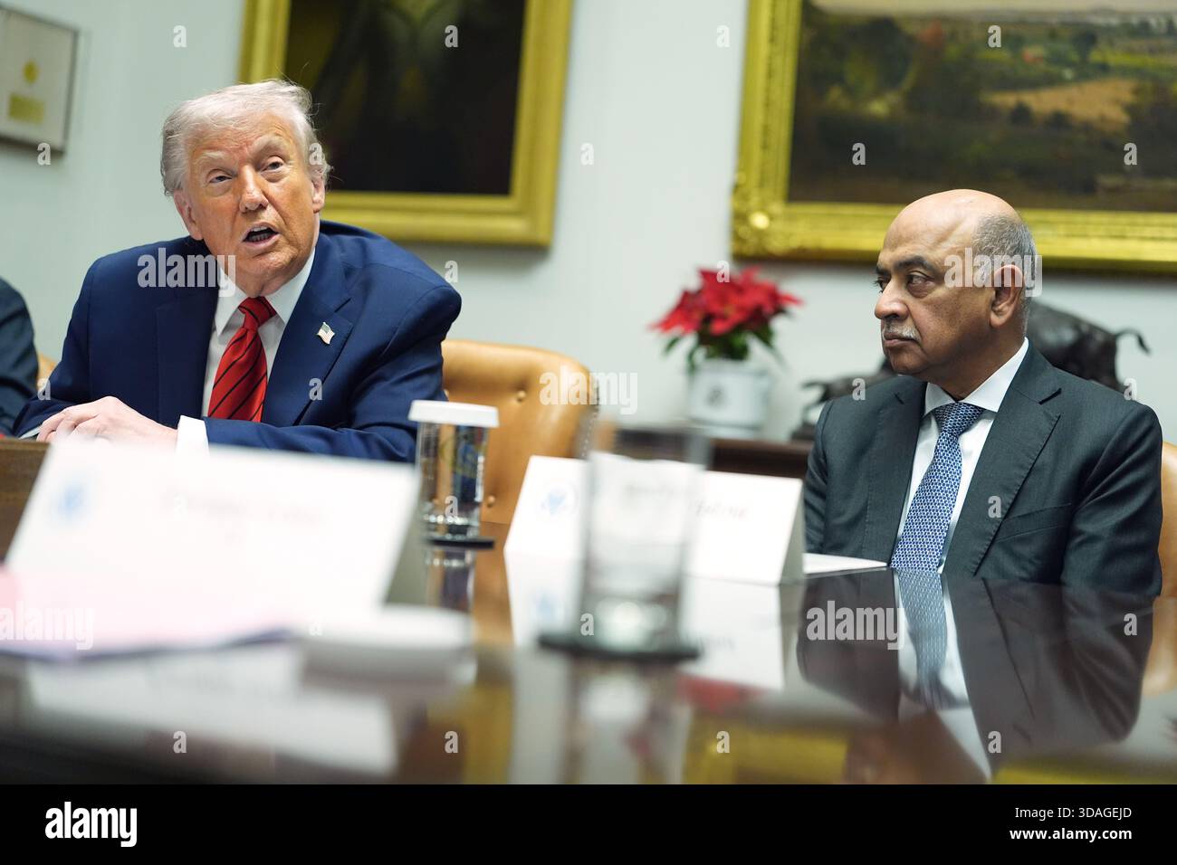 CEO of IBM Arvind Krishna listens to President Donald Trump speak ...