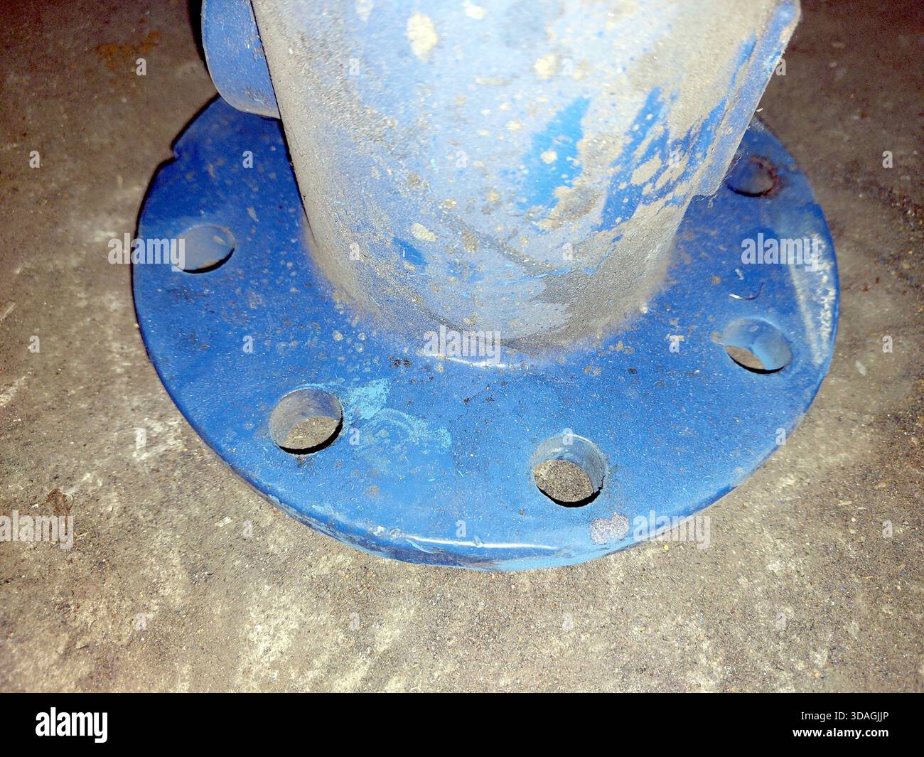 A close view of a flange connected to a shut off valve on industrial ...