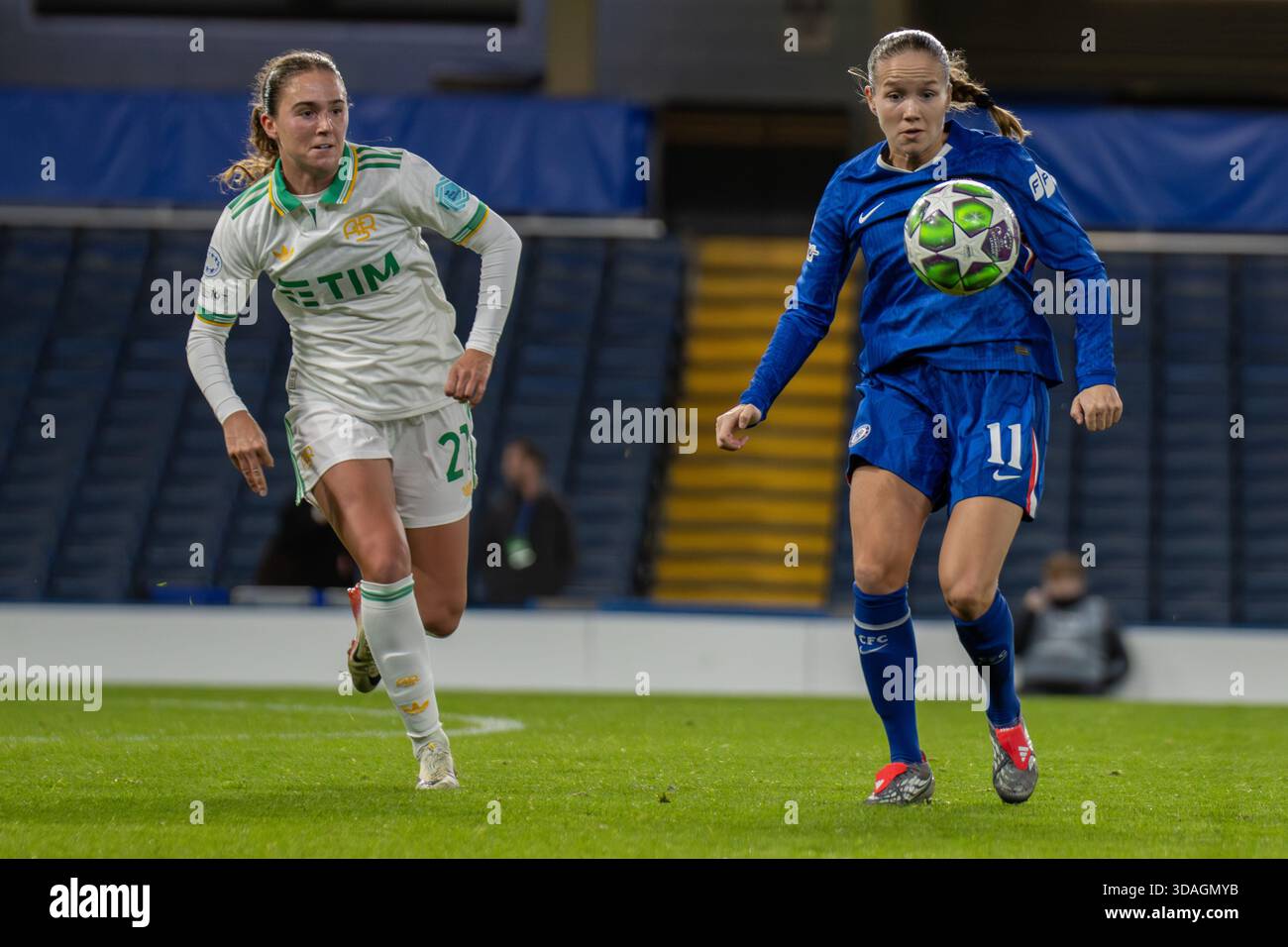 Guro Reiten (11 Chelsea) tries to hold up the ball from Mia Pante (21 ...