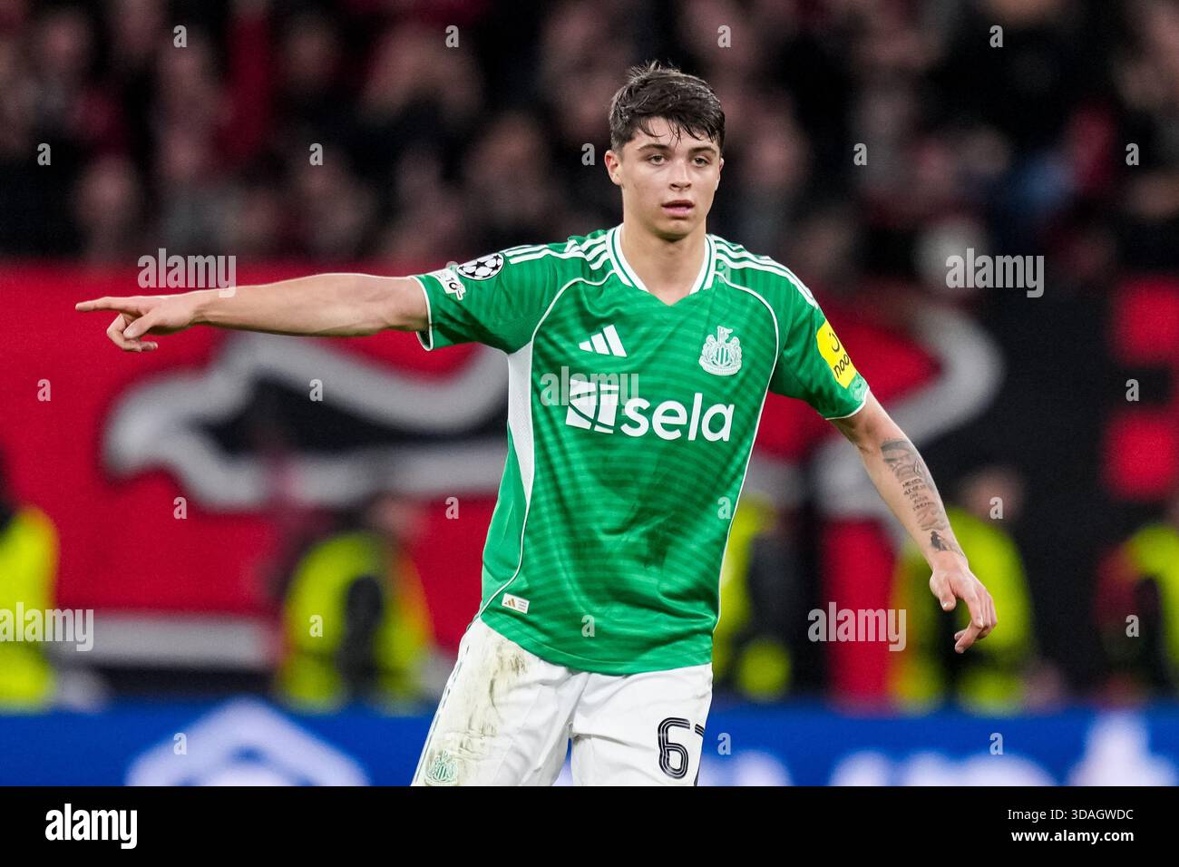LEVERKUSEN, GERMANY - DECEMBER 10: Lewis Miley of Newcastle United ...