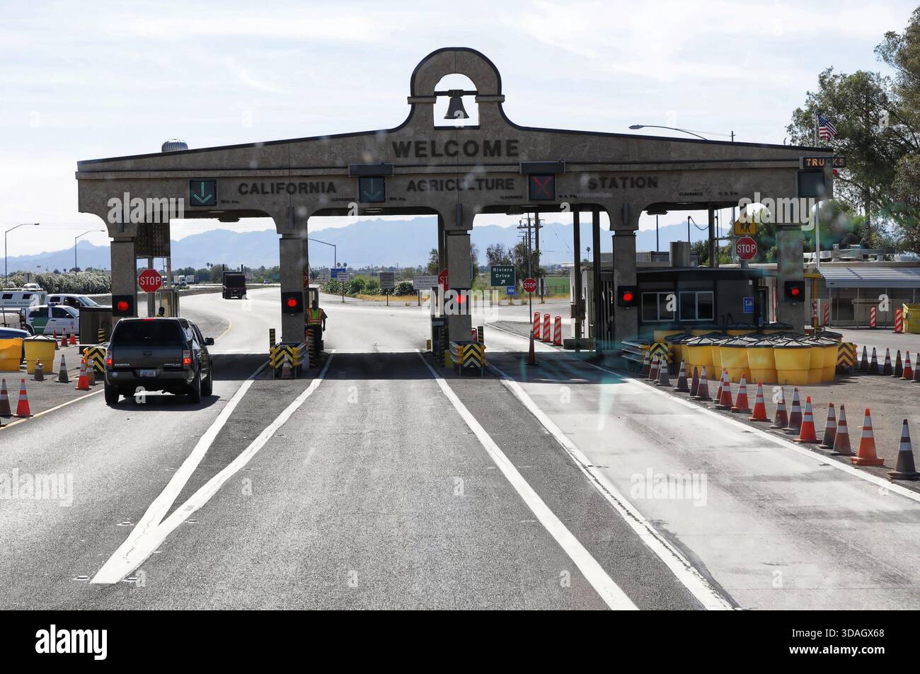 Highway toll booth with multiple lanes and signs, Joshua Tree National ...