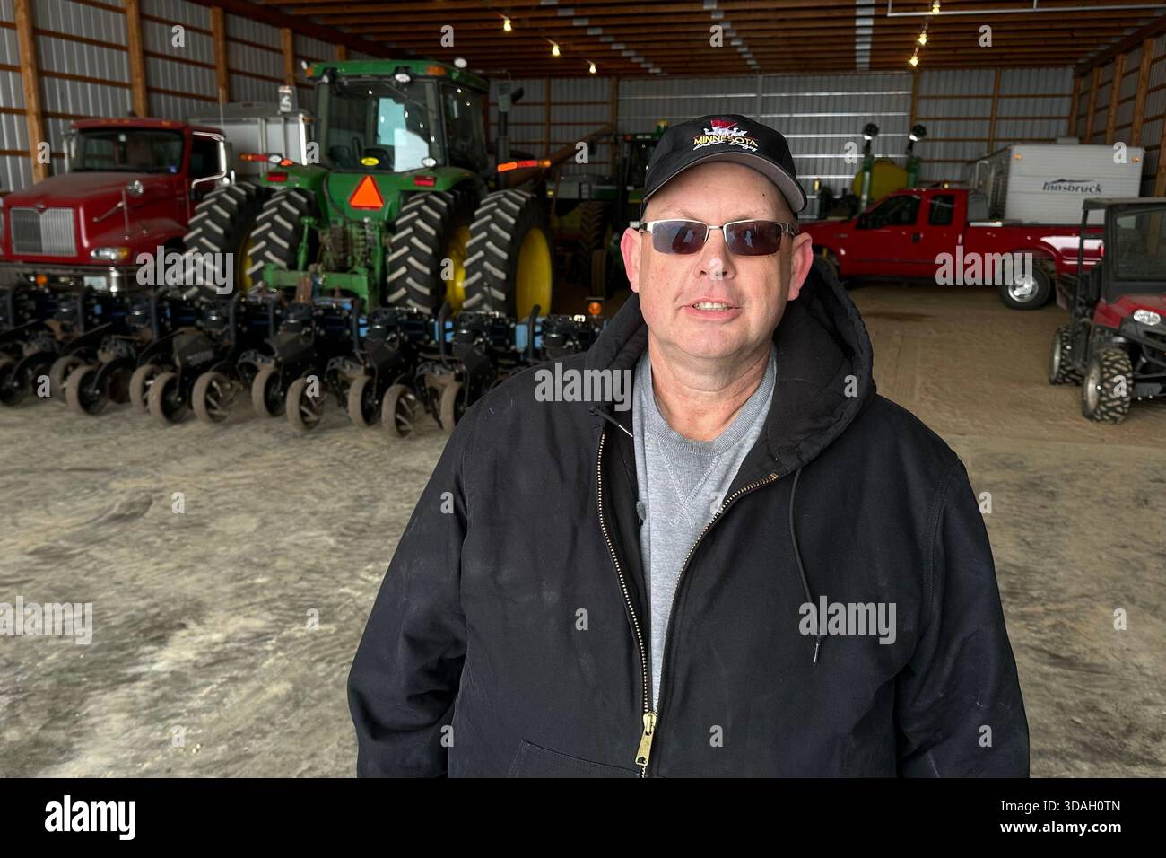 Charlie Radman, a corn and soybean farmer, stands for a photo on the ...