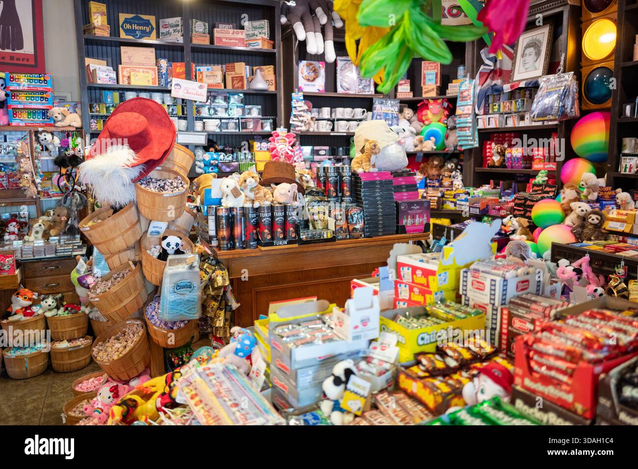 Interior of a candy store with candy visible throughout the space ...
