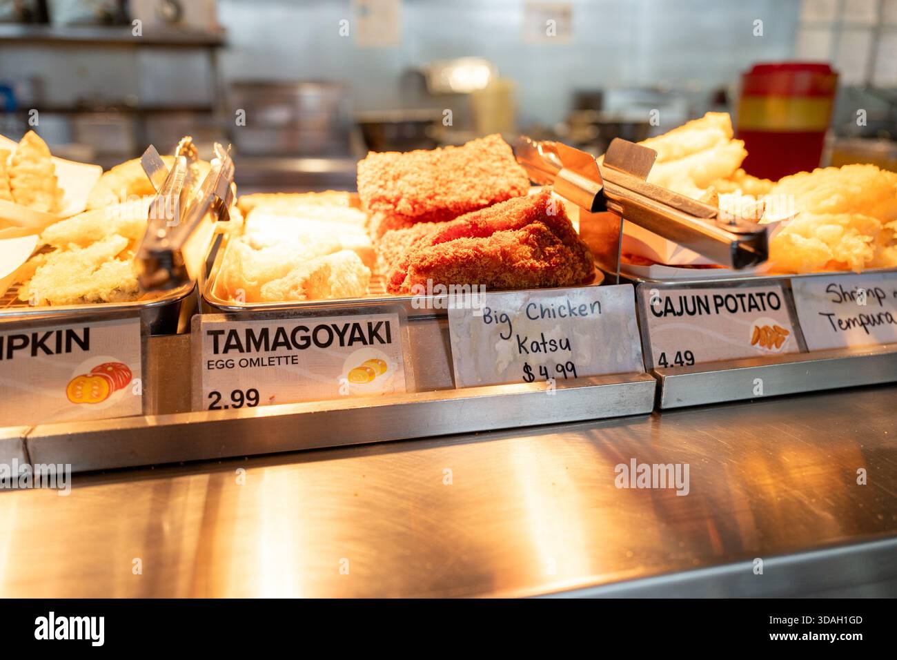 A "Tempura Bar" with various tempura options at Marugame Udon, San ...