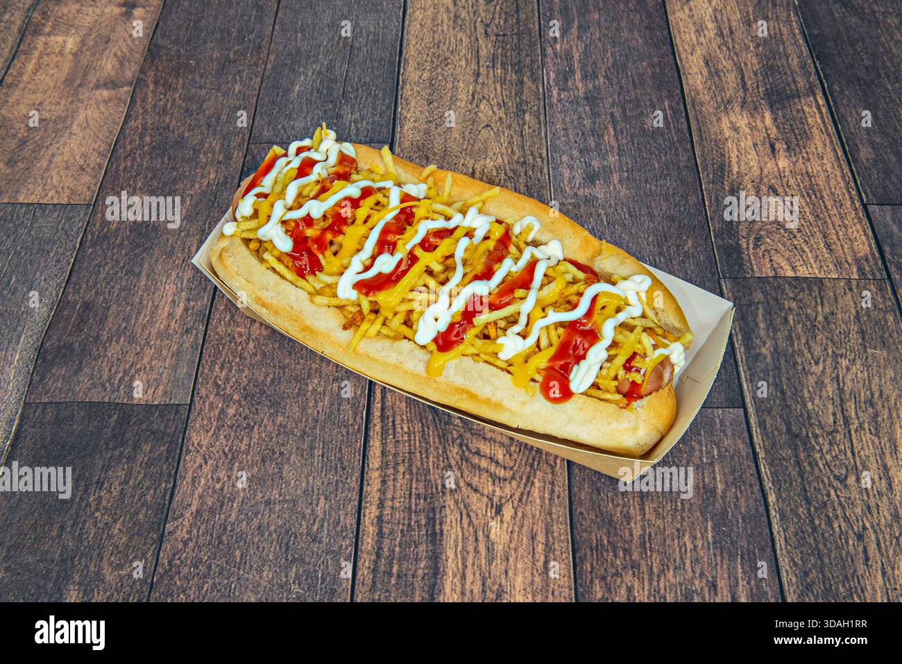 A Hawaiian hot dog served in a sweet bun, with grilled pineapple ...