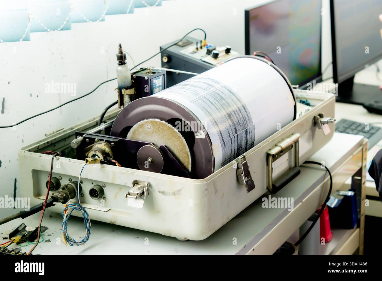 A seismograph is recording volcanic activity. A seismograph is an ...