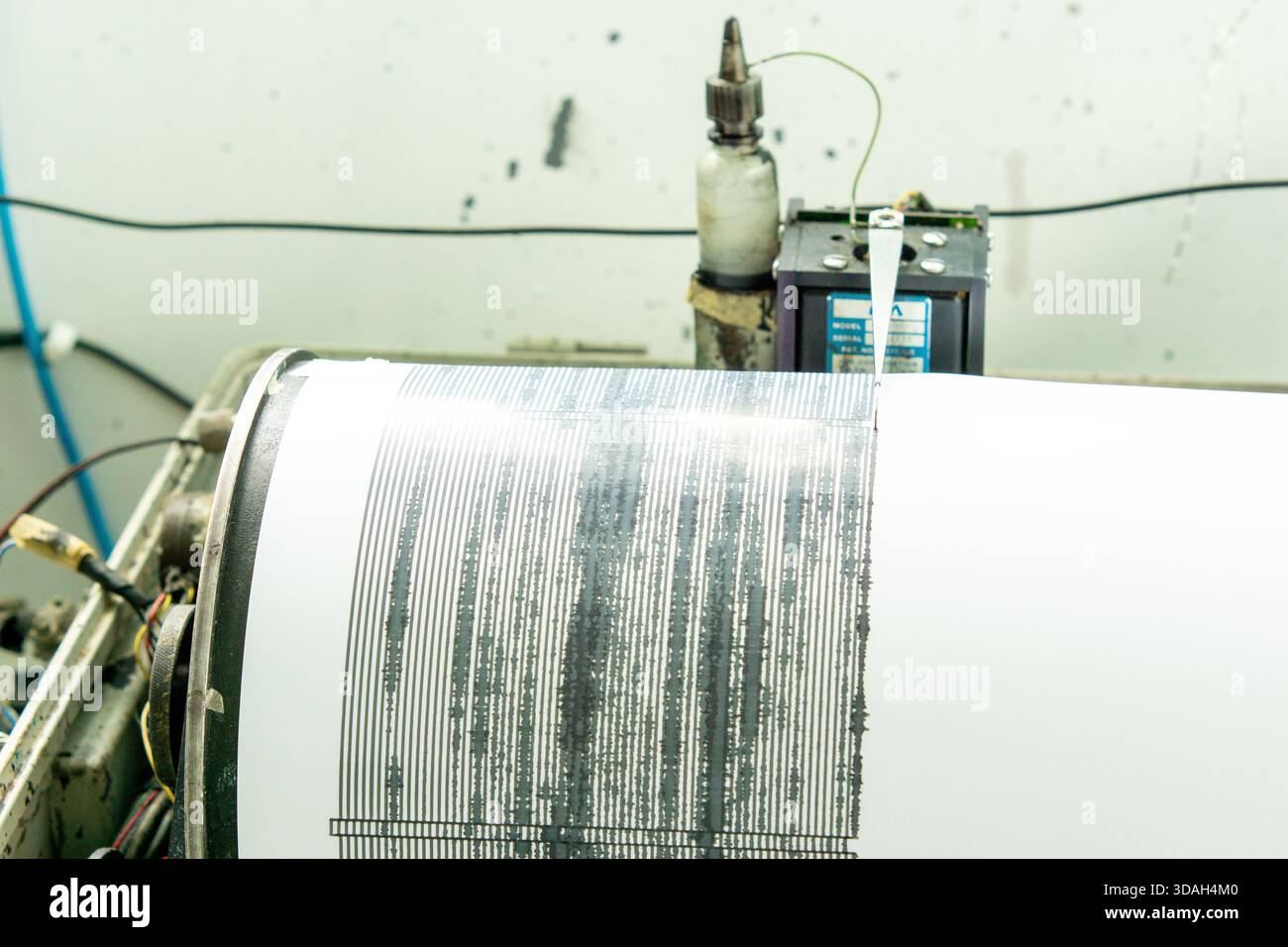 A seismograph is recording volcanic activity. A seismograph is an ...