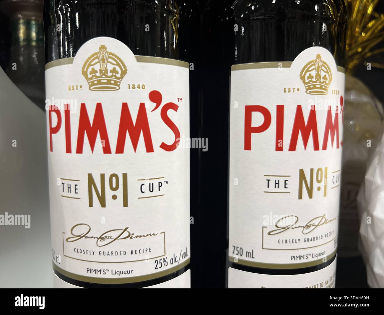 Close-up of Pimm's No 1 liqueur bottles displayed on a shelf in ...