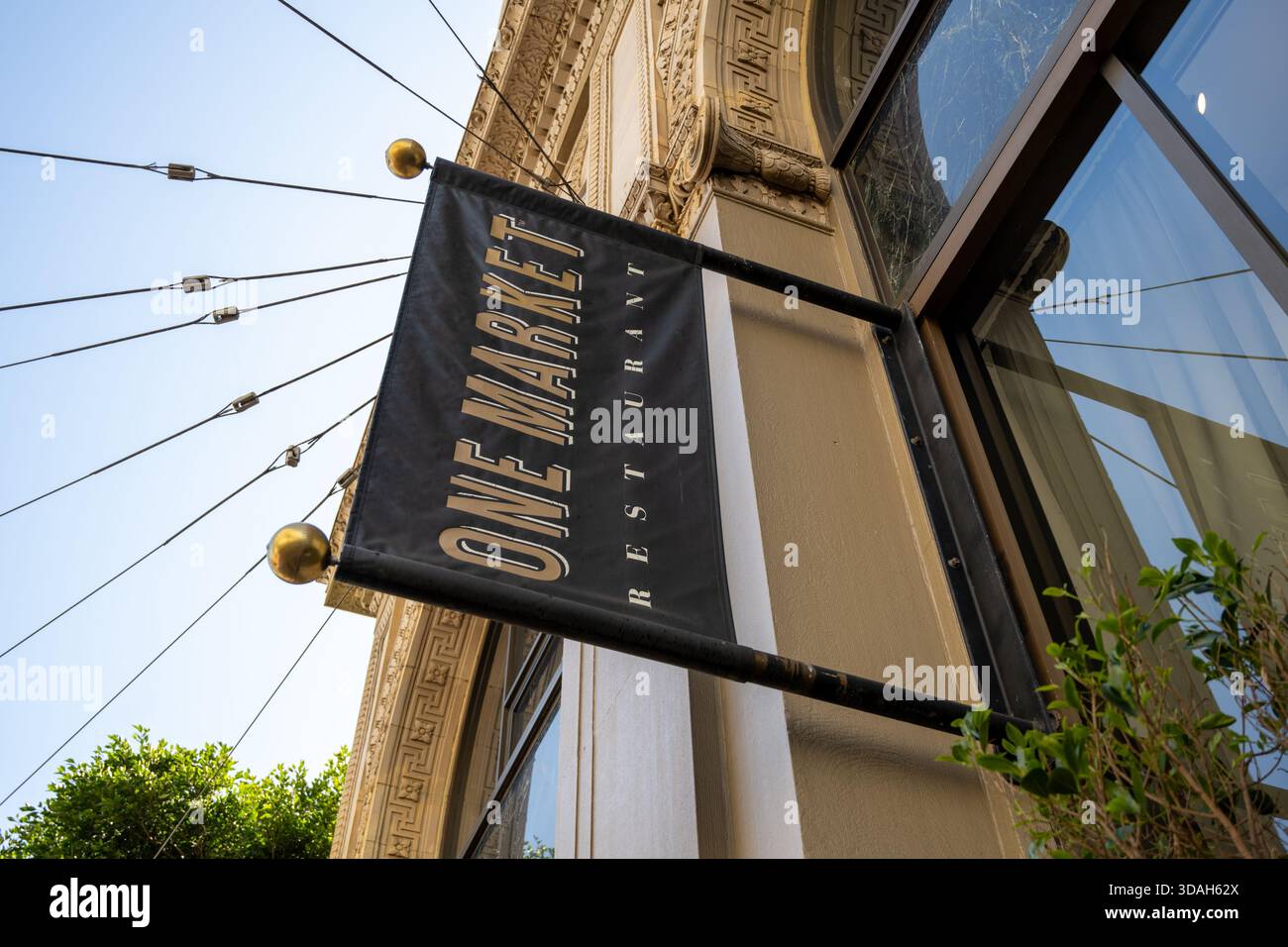 Vertical banner sign for One Market Restaurant on ornate downtown ...