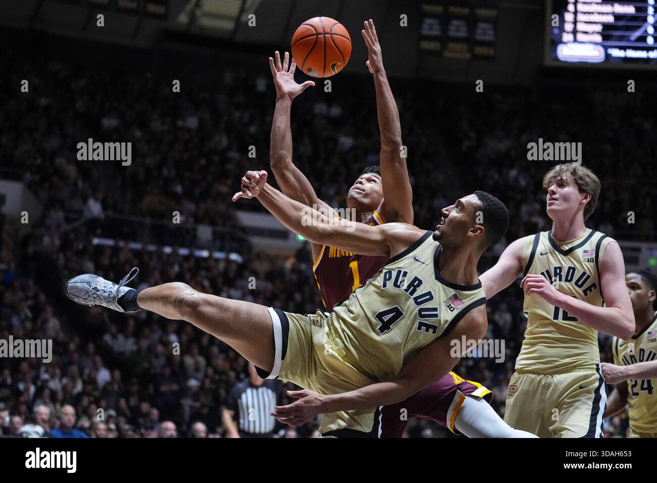 Purdue forward Trey Kaufman-Renn (4) and Minnesota guard Isaac Asuma (1 ...