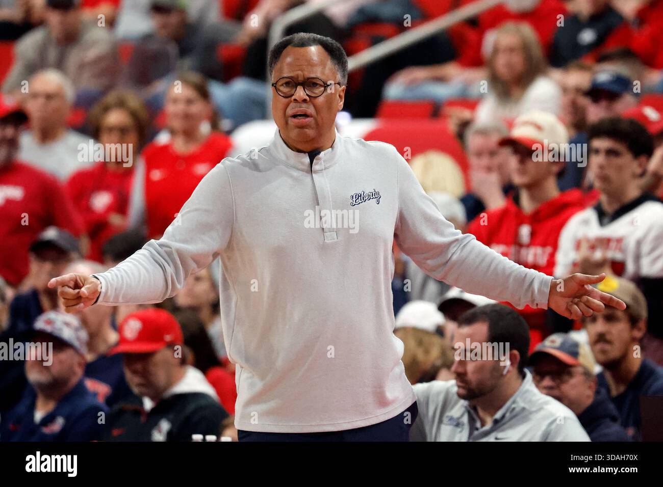 Liberty head coach Ritchie McKay protests a call during the first half ...