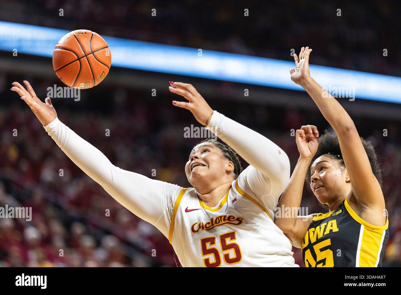 Iowa State center Audi Crooks (55) catches the ball in the post as Iowa ...