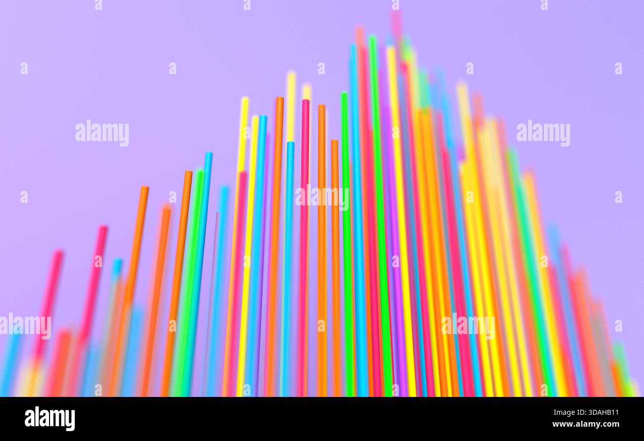 Close up pyramid of colored narrow cylinders, partially blurred. Close ...