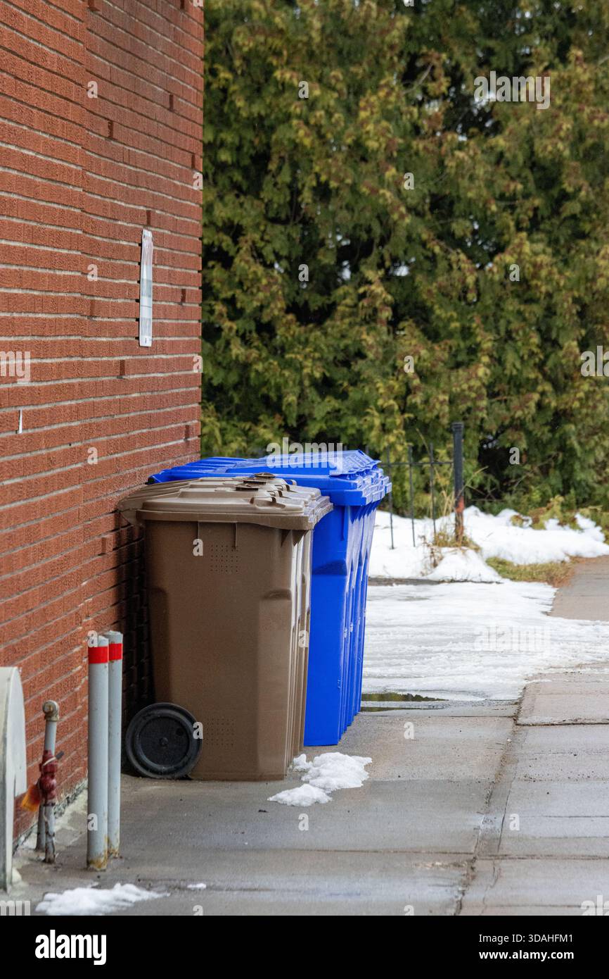 Canada, Quebec, 27 November 2025 : Garbage and recycling bins beside a ...