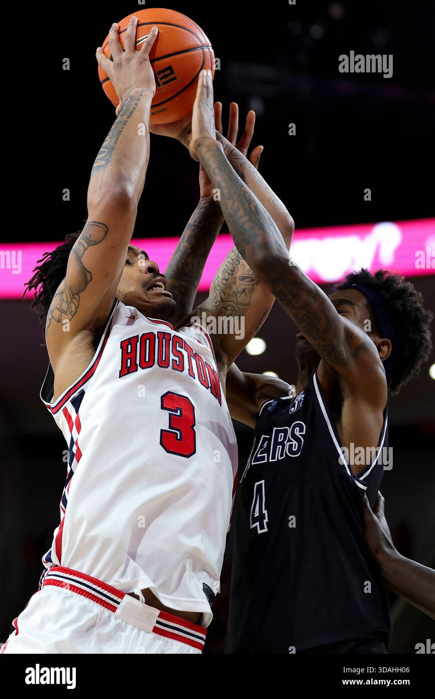 Houston Cougars guard Ramon Walker Jr. (3) shoots the ball as Jackson ...