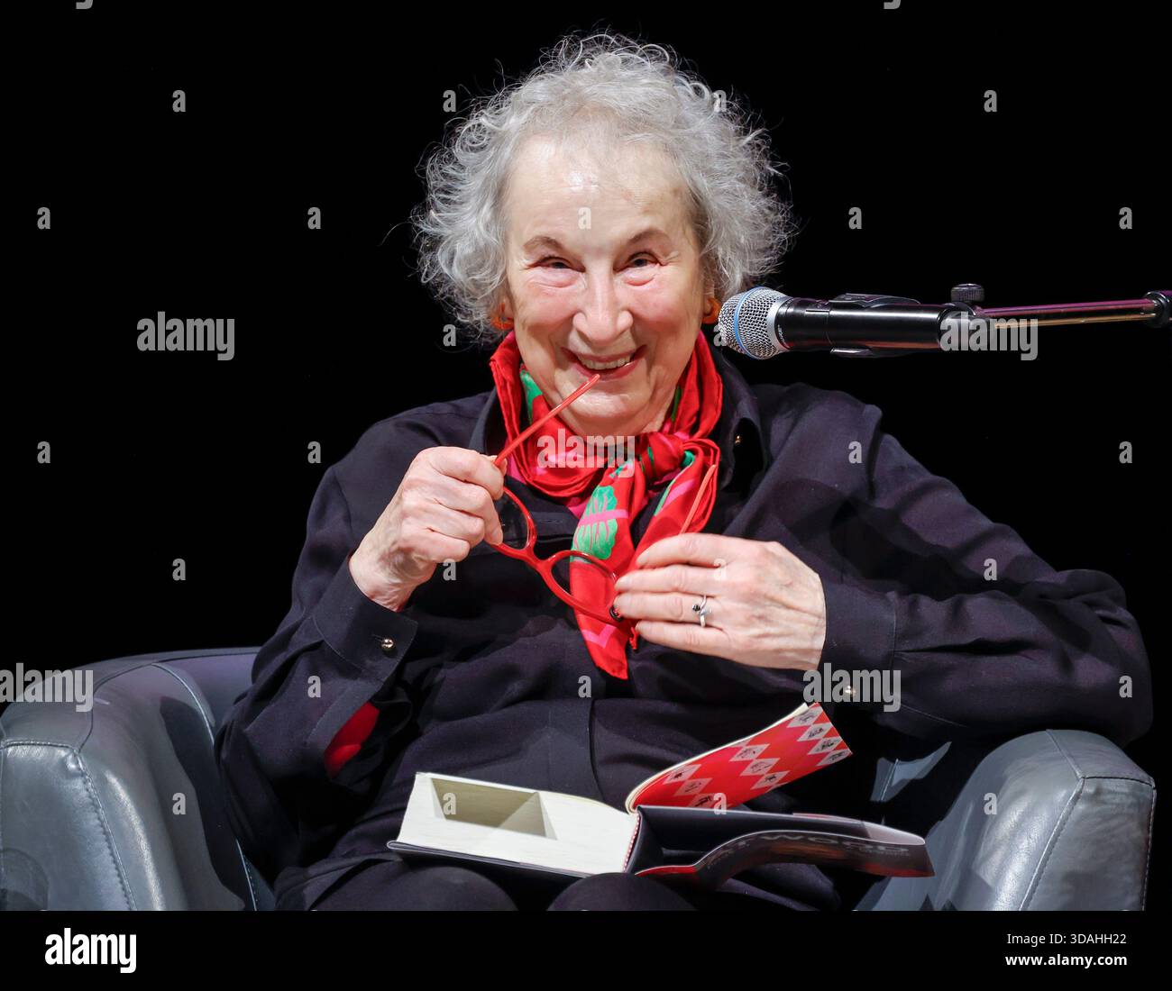 Margaret Atwood laughs as she prepares to read from her book while ...