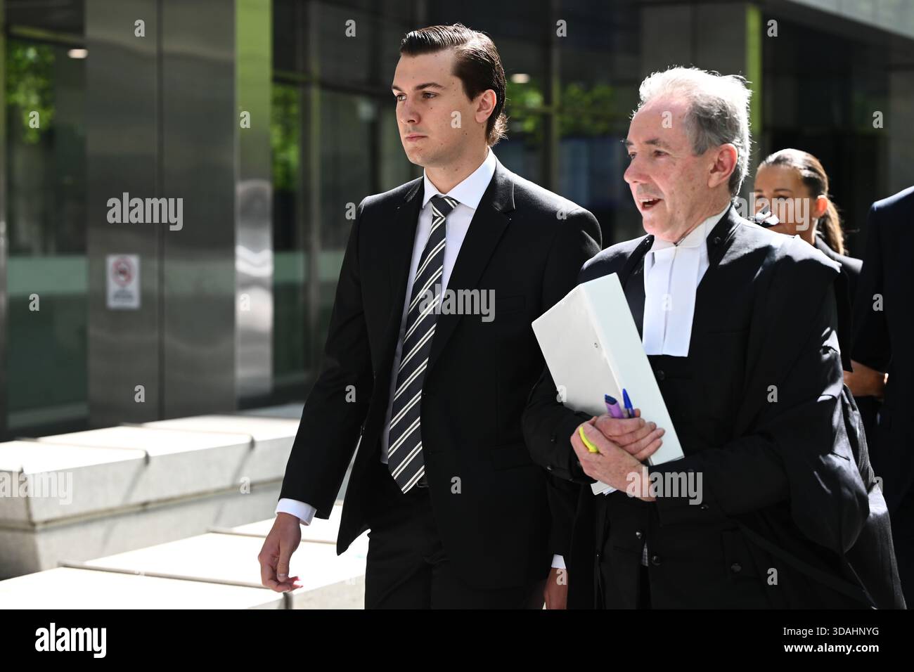 Tom Silvagni (left) arrives at the County Court of Victoria, in ...