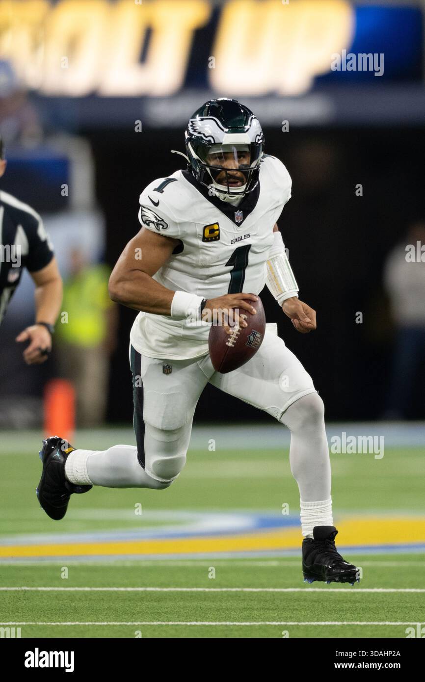 Philadelphia Eagles quarterback Jalen Hurts (1) runs with the ball ...