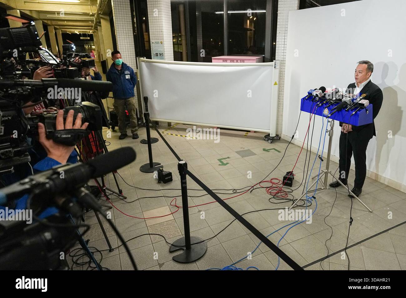 Joe Chow Yat-ming (first right), Commissioner of Police, speaking to the press on December 10 ...