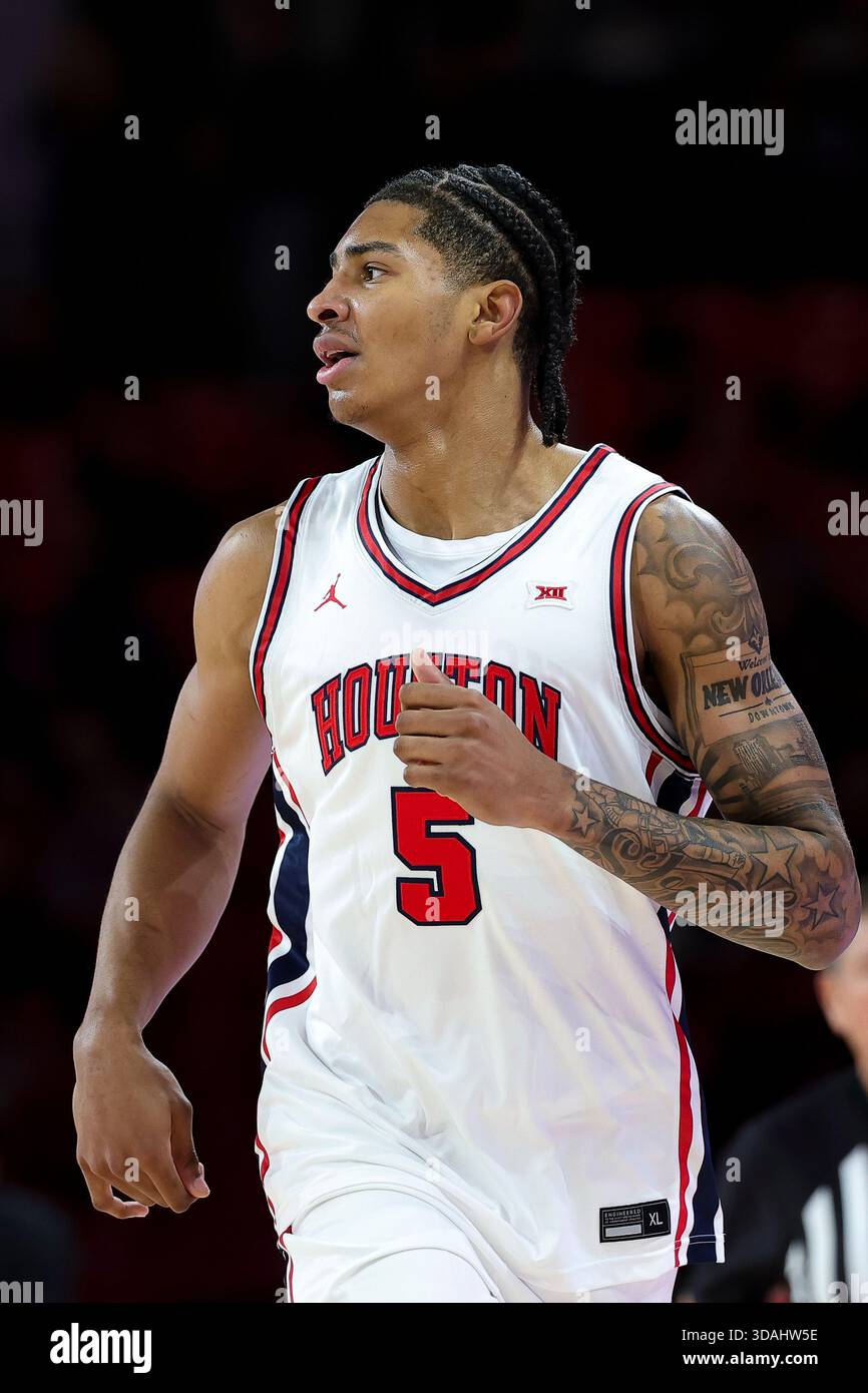 Houston center Chris Cenac Jr. (5) looks on during the first half of an ...
