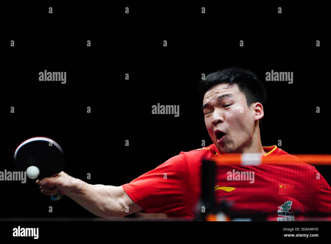 Xiang Peng, a Chinese table tennis player during the game at WTT finals ...