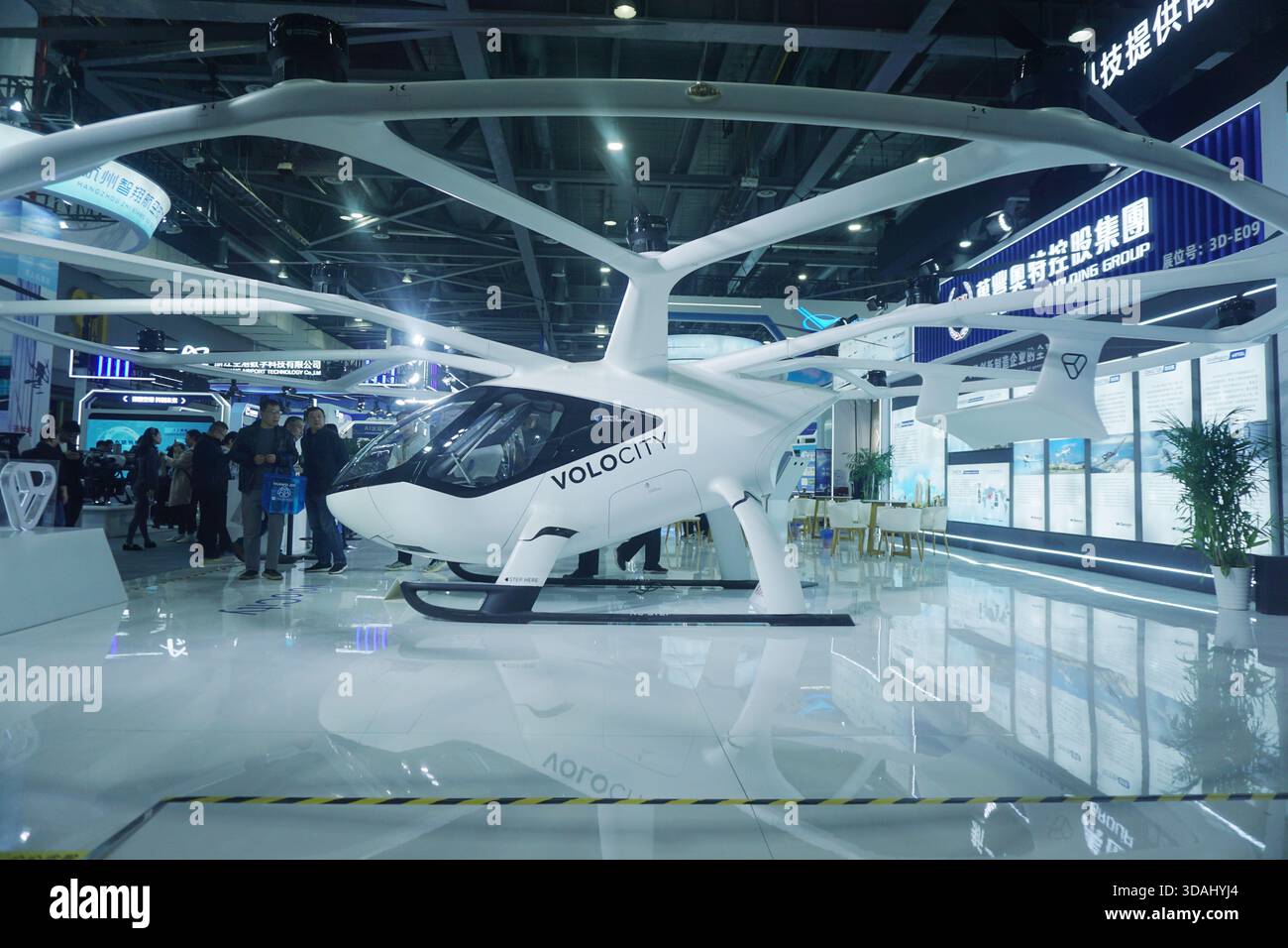 HANGZHOU, CHINA - DECEMBER 11, 2025 - Viewers watch WANFENG AUTO WHEEL ...
