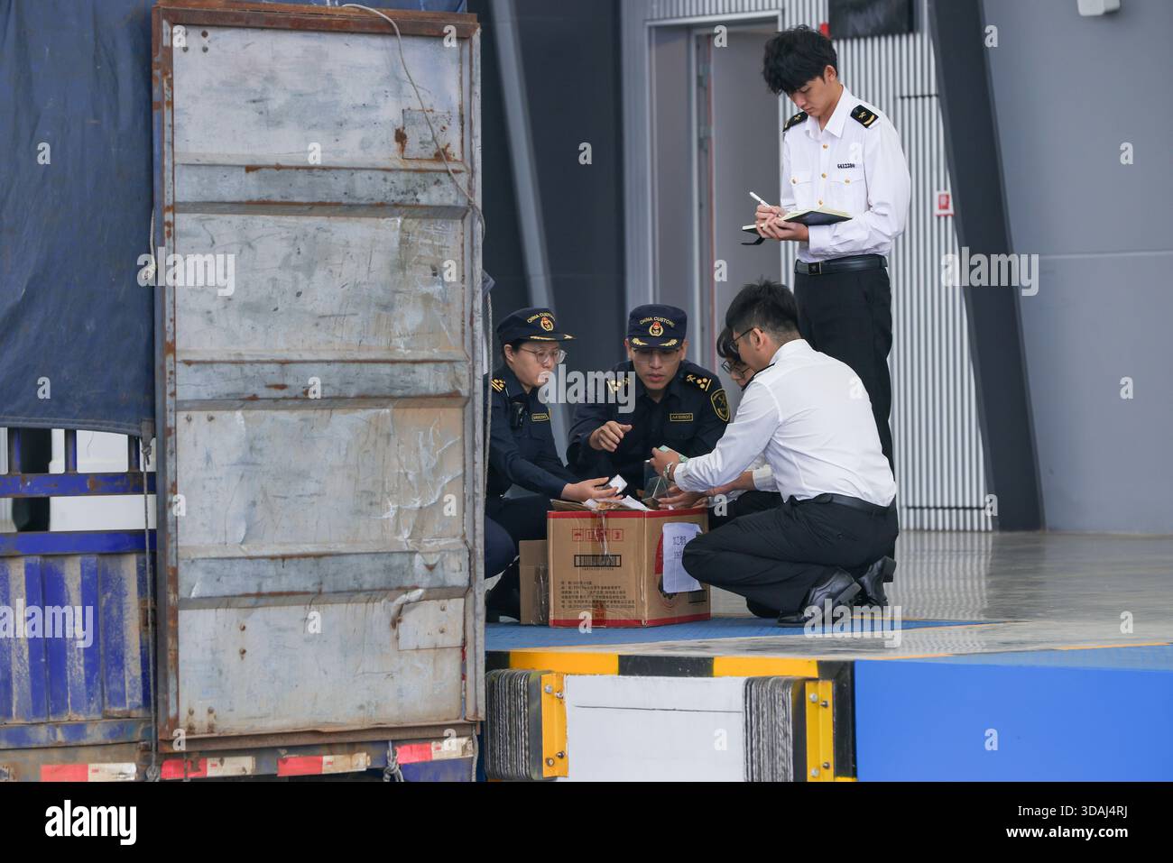 Haikou,China.10th December 2025. As the island-wide customs operation ...