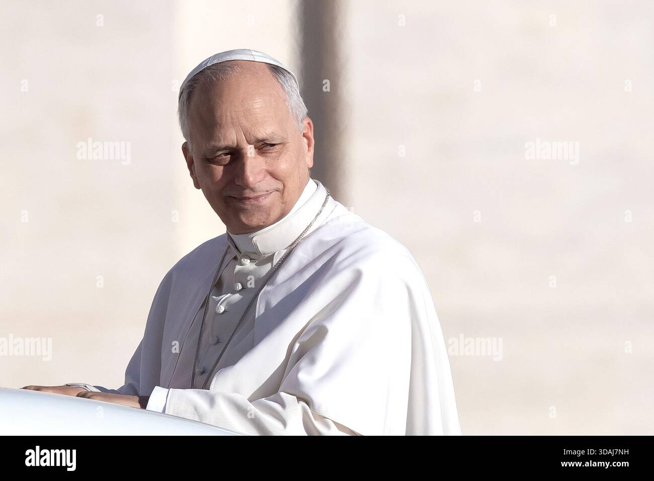 Pope Leo XIV waves as he arrives for his weekly general audience in St ...