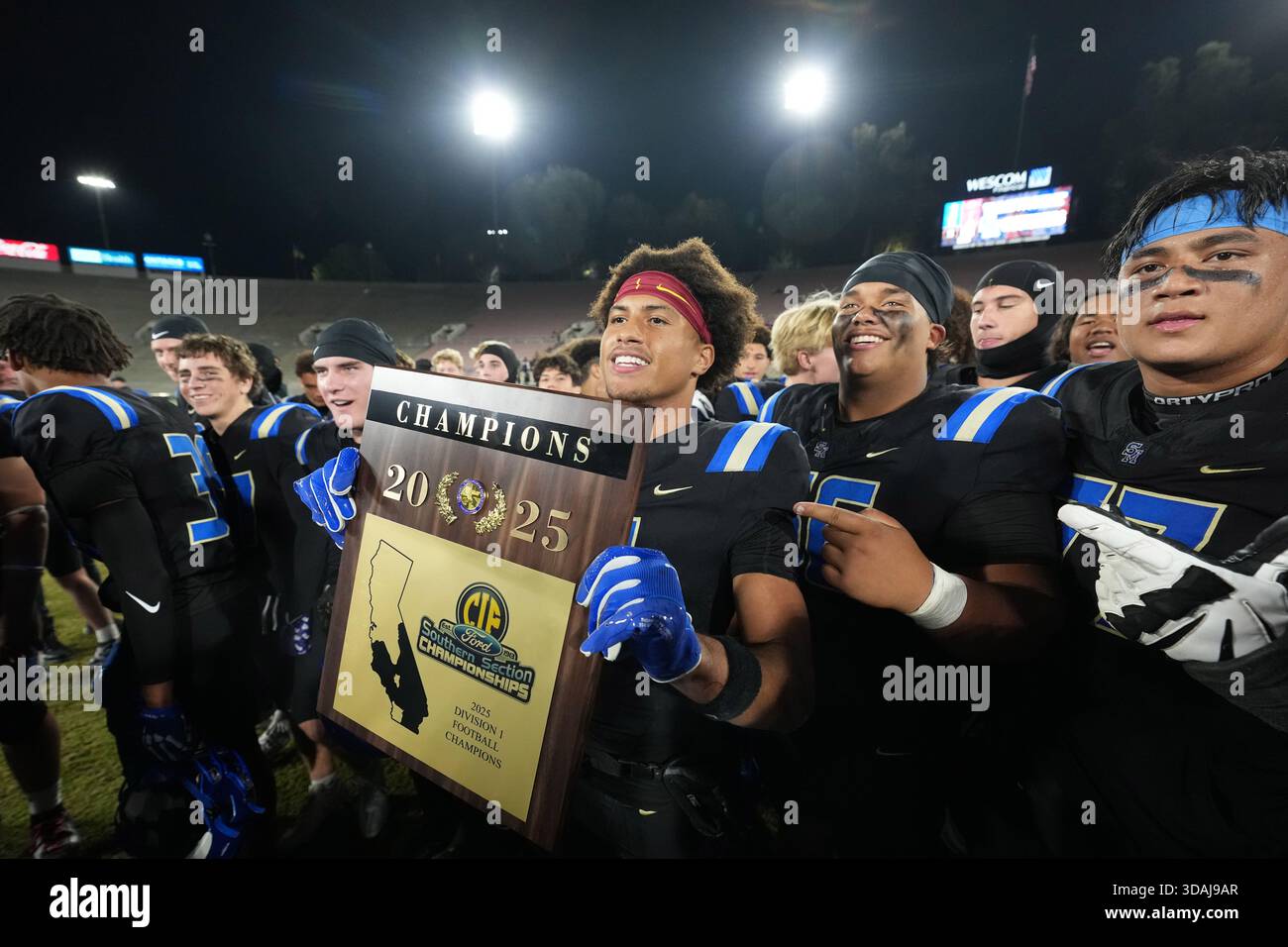 Santa Margarita Catholic Eagles receiver Trent Mosley holds the team ...