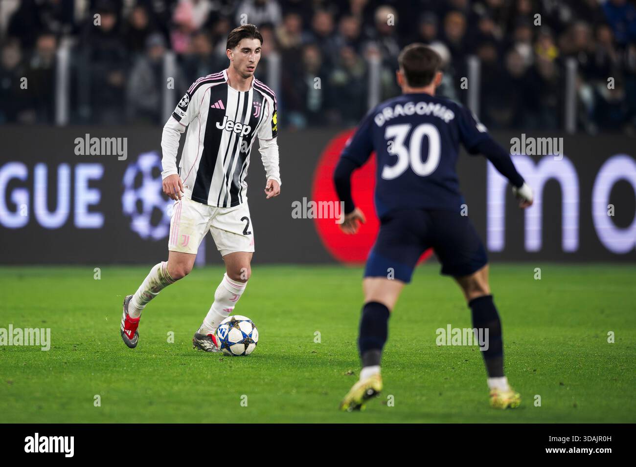 Fabio Miretti of Juventus FC is challenged by Vlad Dragomir of Pafos FC ...