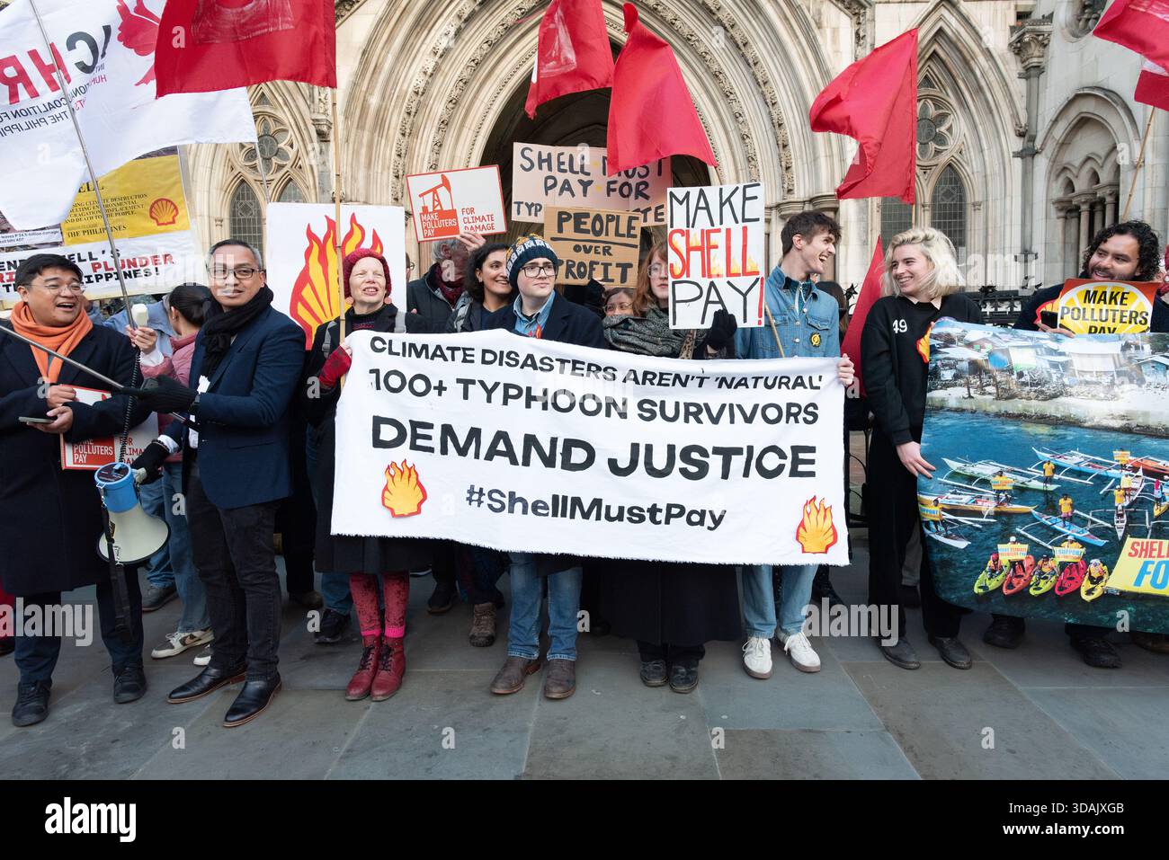 London, UK. 11 December, 2025. Supporters rally at the Royal Courts of ...