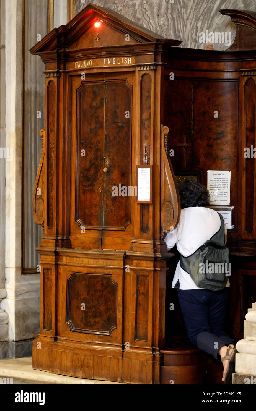 Santa Maria Maggiore Basilica. Baroque confessional with Italian and ...