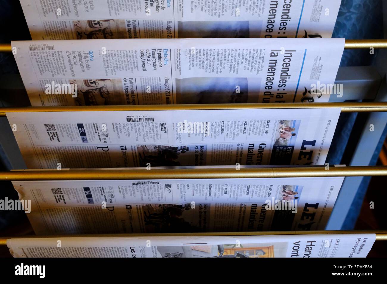 Daily newspapers on a display stand. Information. France Stock Photo ...