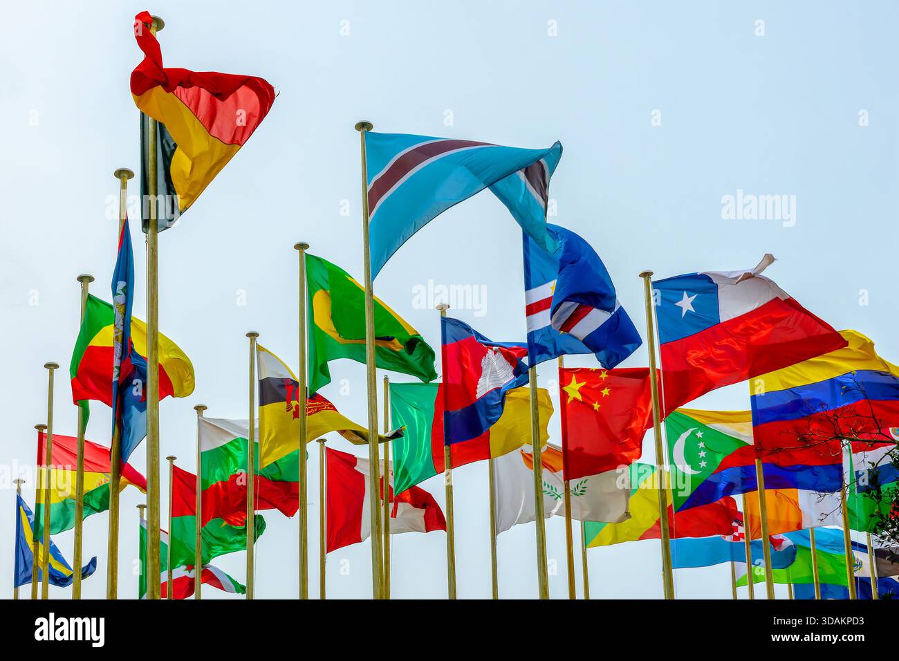 Many poles with flags of countries and all nations members of UN ...