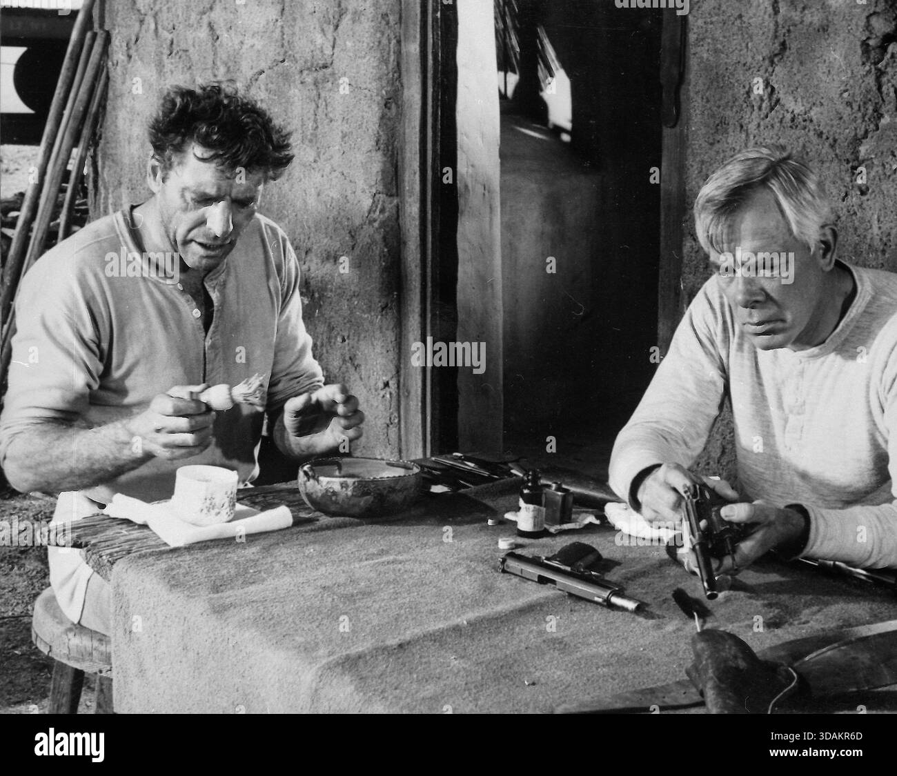 Actors Lee Marving and Burt Lancaster in the movie The Professionals ...