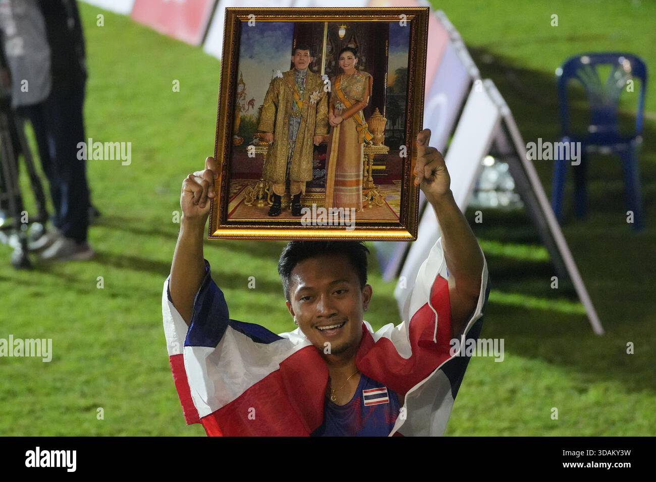 Thailand's Puripol Boonson, right, celebrates after wins the men's 100m ...