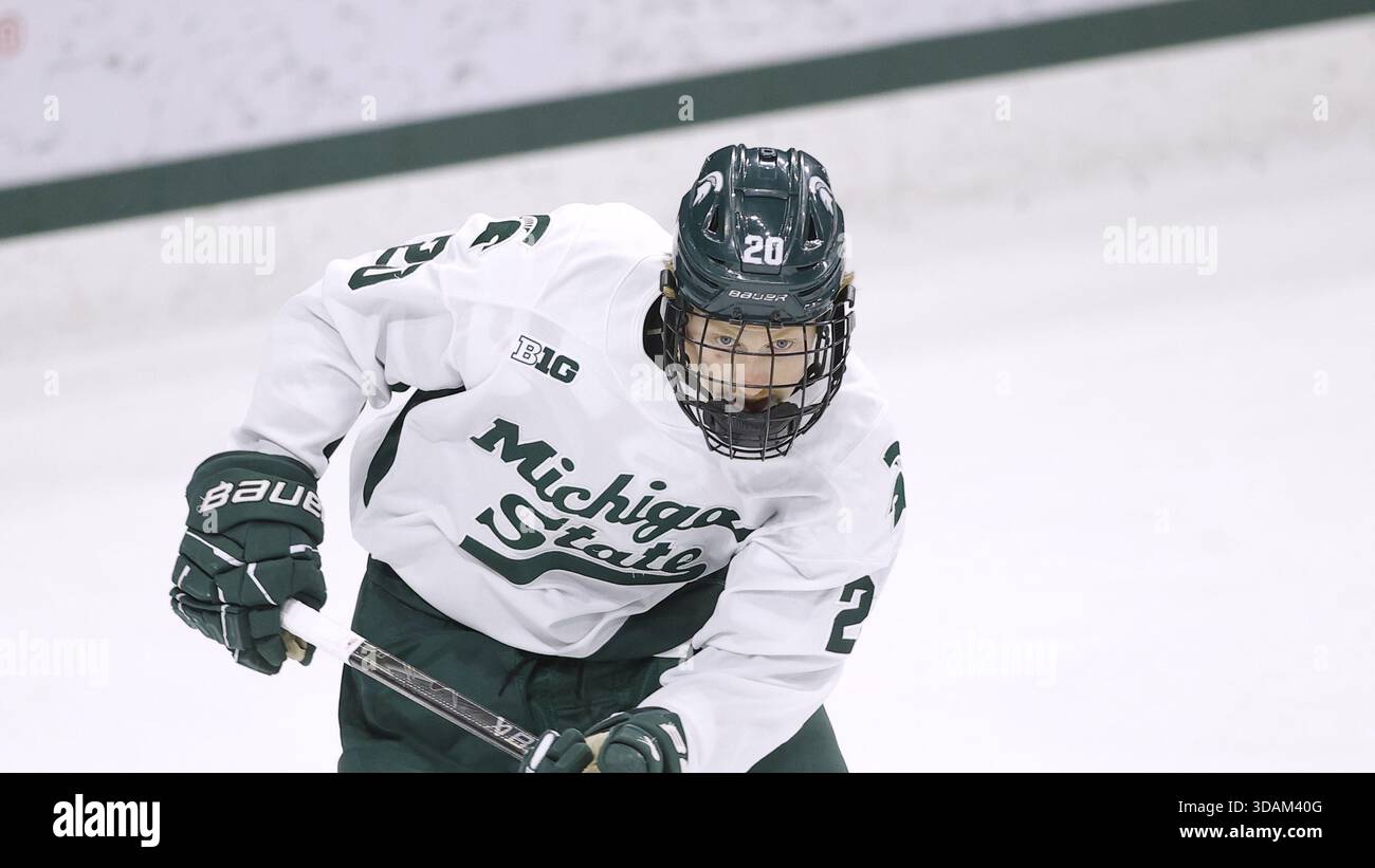 Michigan State's Daniel Russell plays during an NCAA hockey game on ...