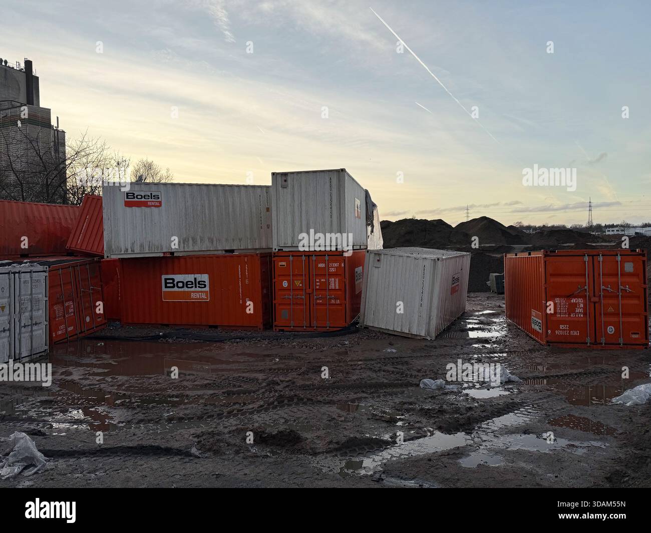 11 December 2025, Hesse, Hanau: View of containers behind which a world ...