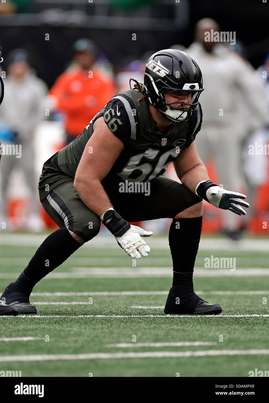New York Jets center Joe Tippmann (66) blocks during an NFL football ...