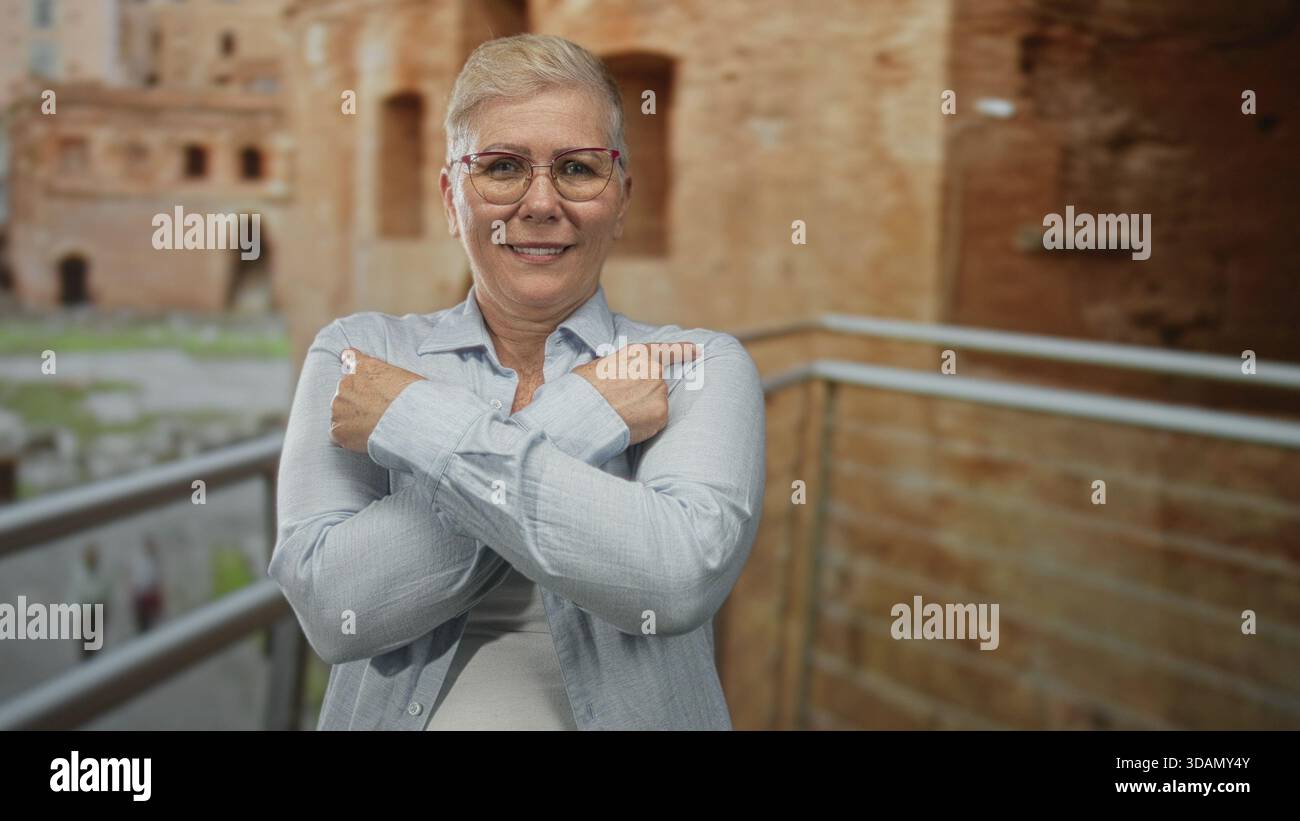Woman crossing arms index hi-res stock photography and images - Alamy