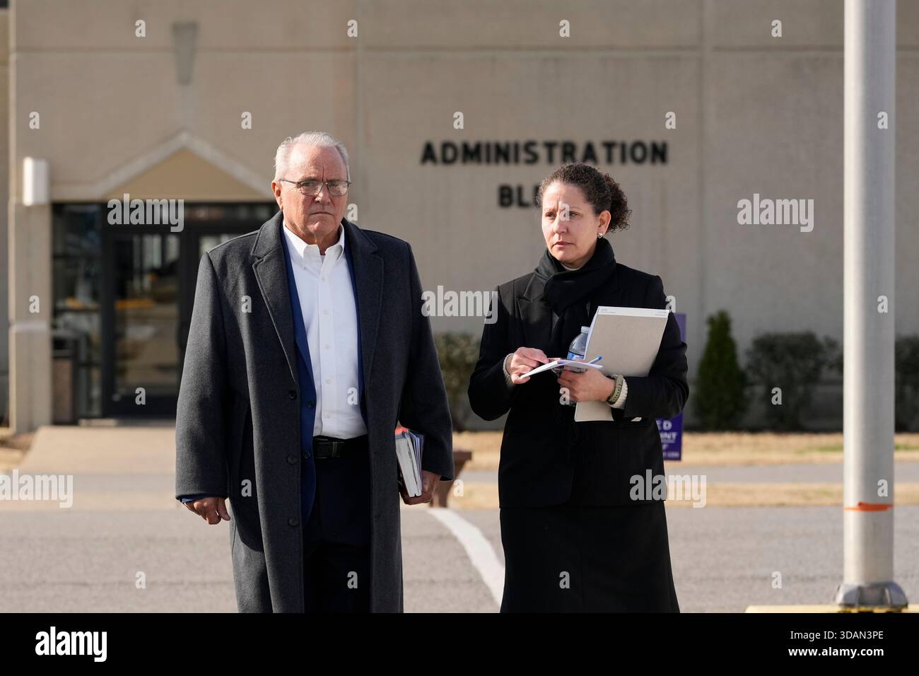 Spiritual advisor J.R. Davis, left, and attorney Deborah Drew, right ...