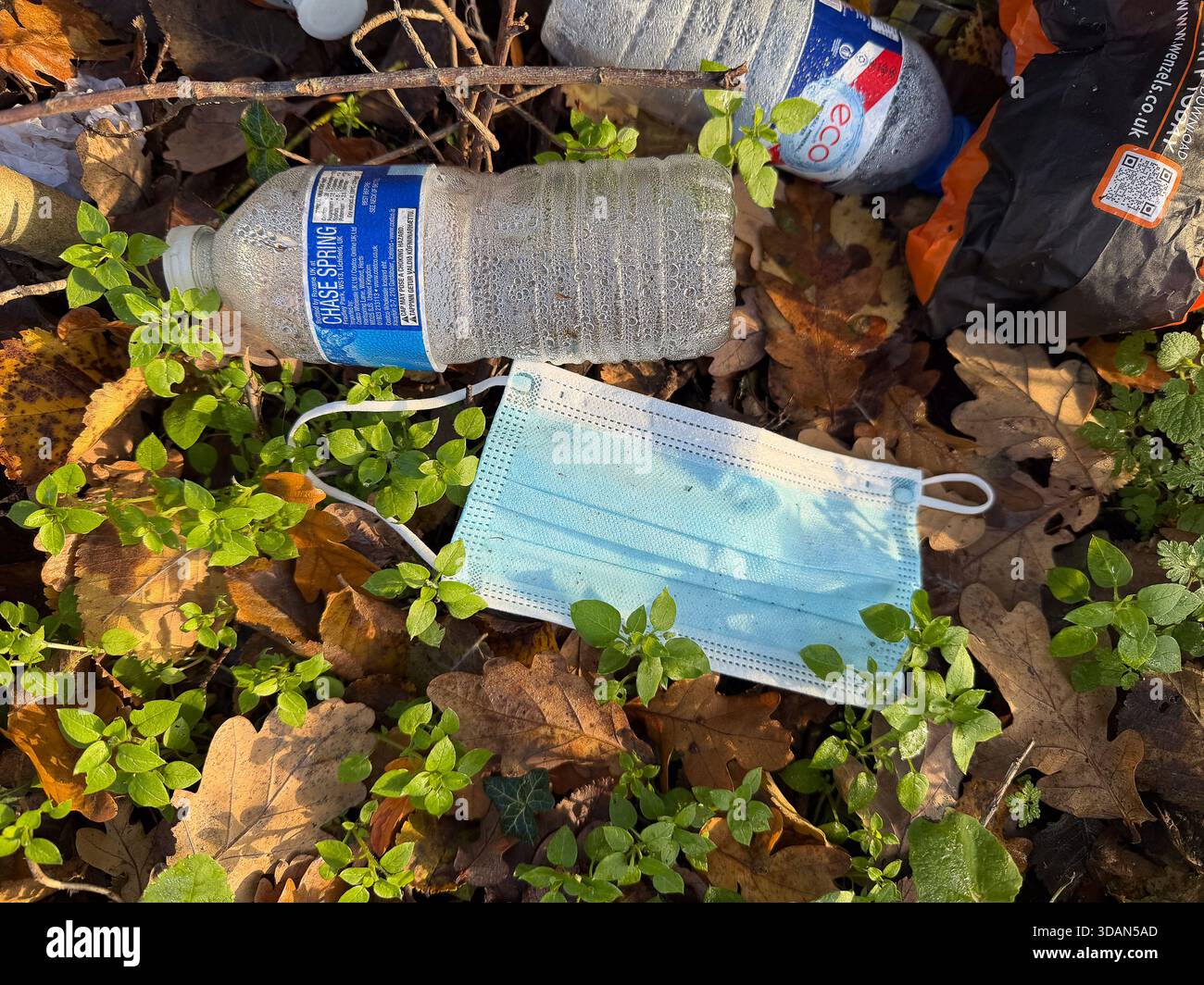 Slough, UK. 11th December, 2025. A discarded face mask outside Wexham ...