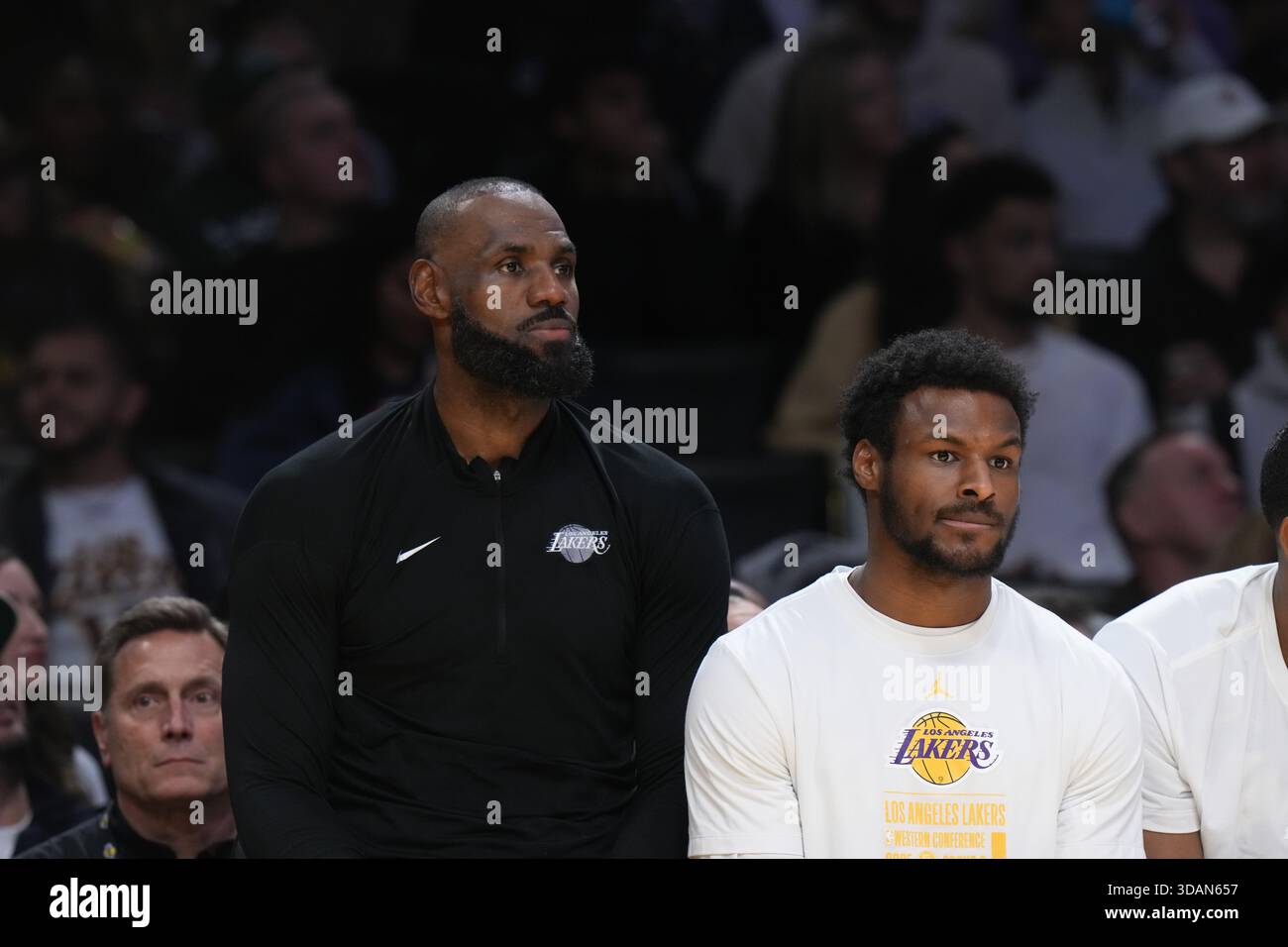 Los Angeles Lakers forward Lebron James, left, and guard Bronny James ...