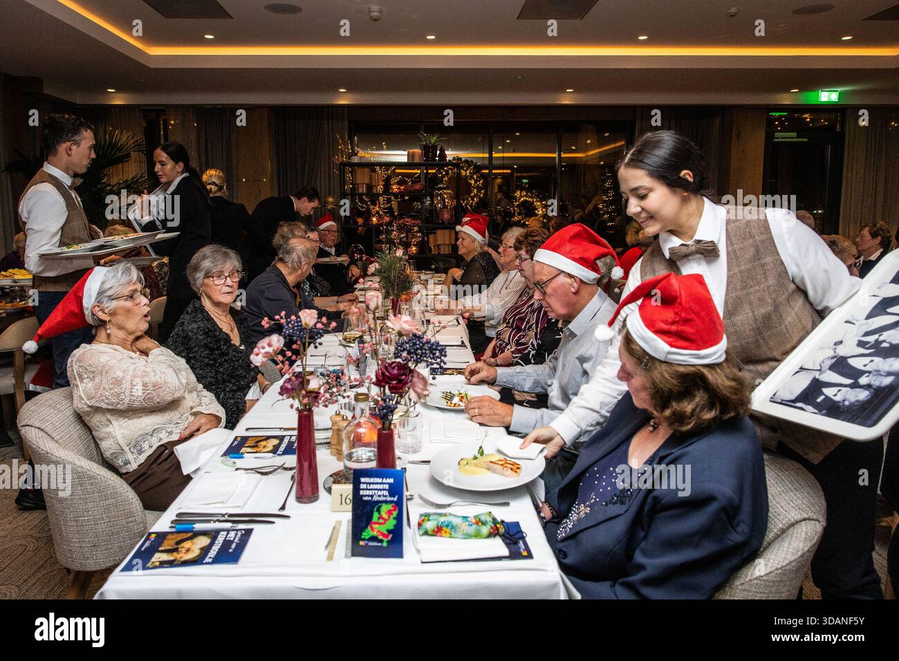 VOLENDAM - Seniors at a special Christmas dinner for seniors organized ...
