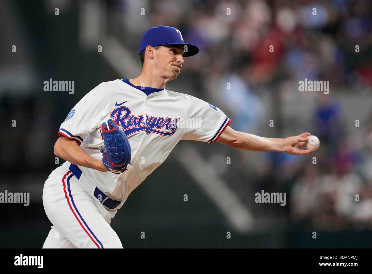 FILE - Texas Rangers relief pitcher Hoby Milner works against the ...