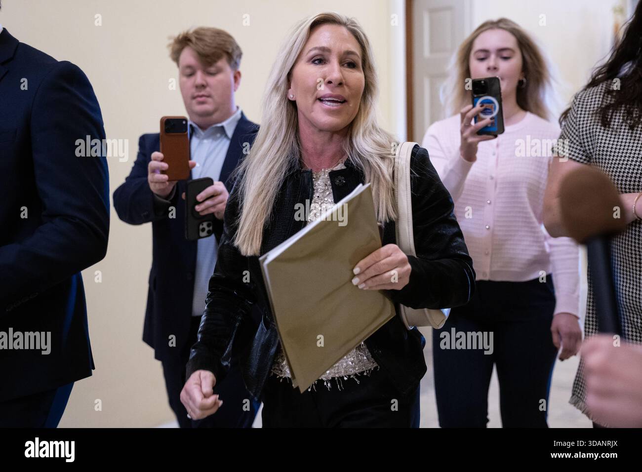 Rep. Marjorie Taylor Greene (R-Ga.) speaks with reporters as she ...