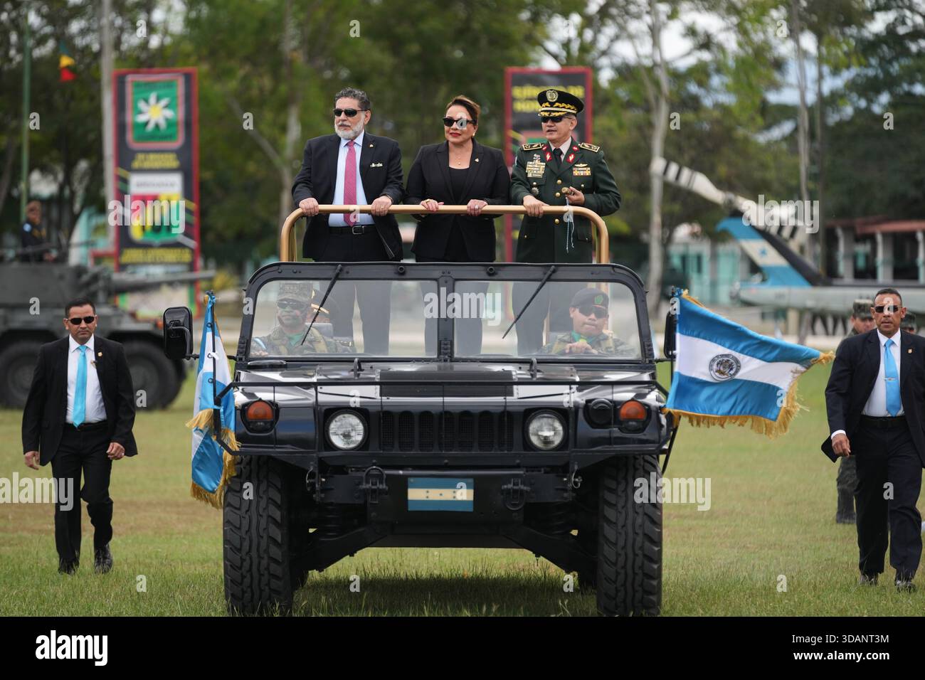 Honduras' President Xiomara Castro, center, accompanied by General ...