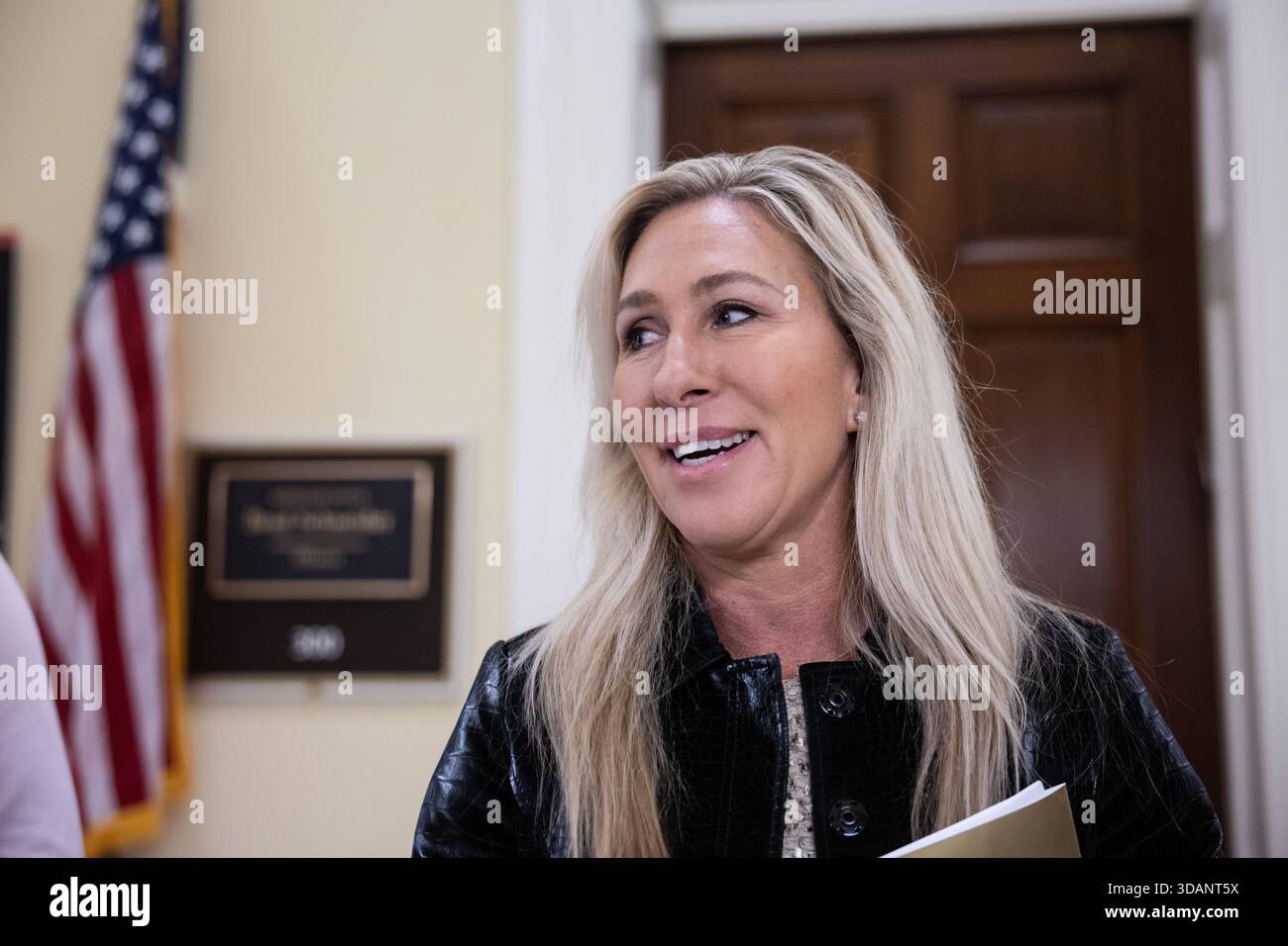 Rep. Marjorie Taylor Greene (R-Ga.) waits for an elevator as she ...