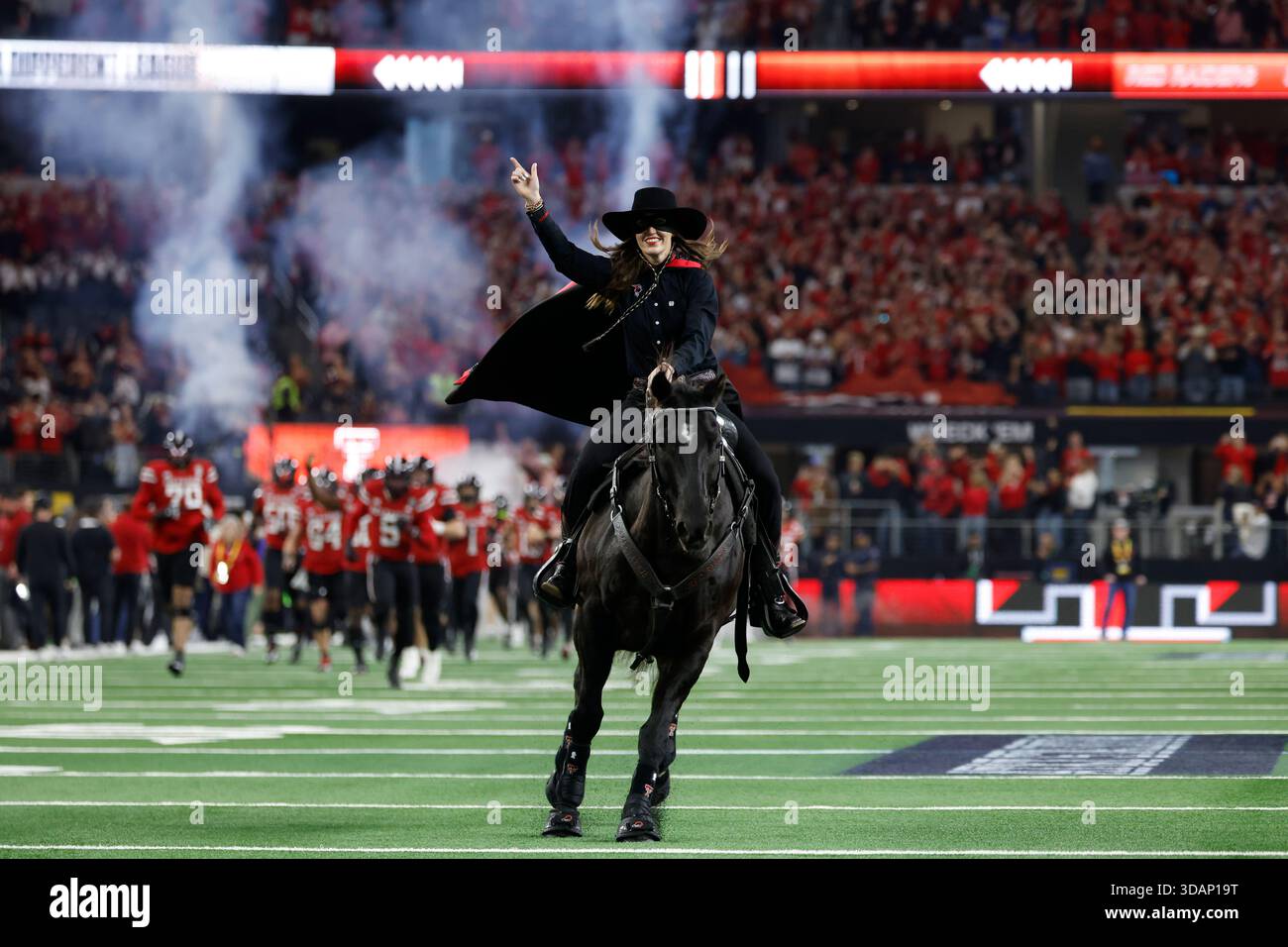 Texas Tech University masked rider takes the field with the football ...