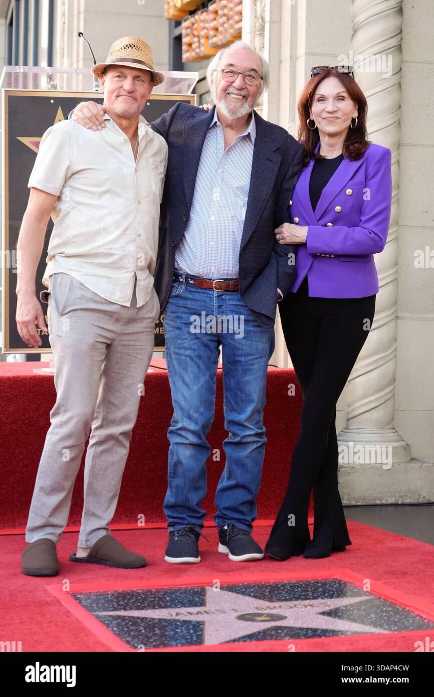 Woody Harrelson, from left, Marilu Henner, and James L. Brooks pose ...